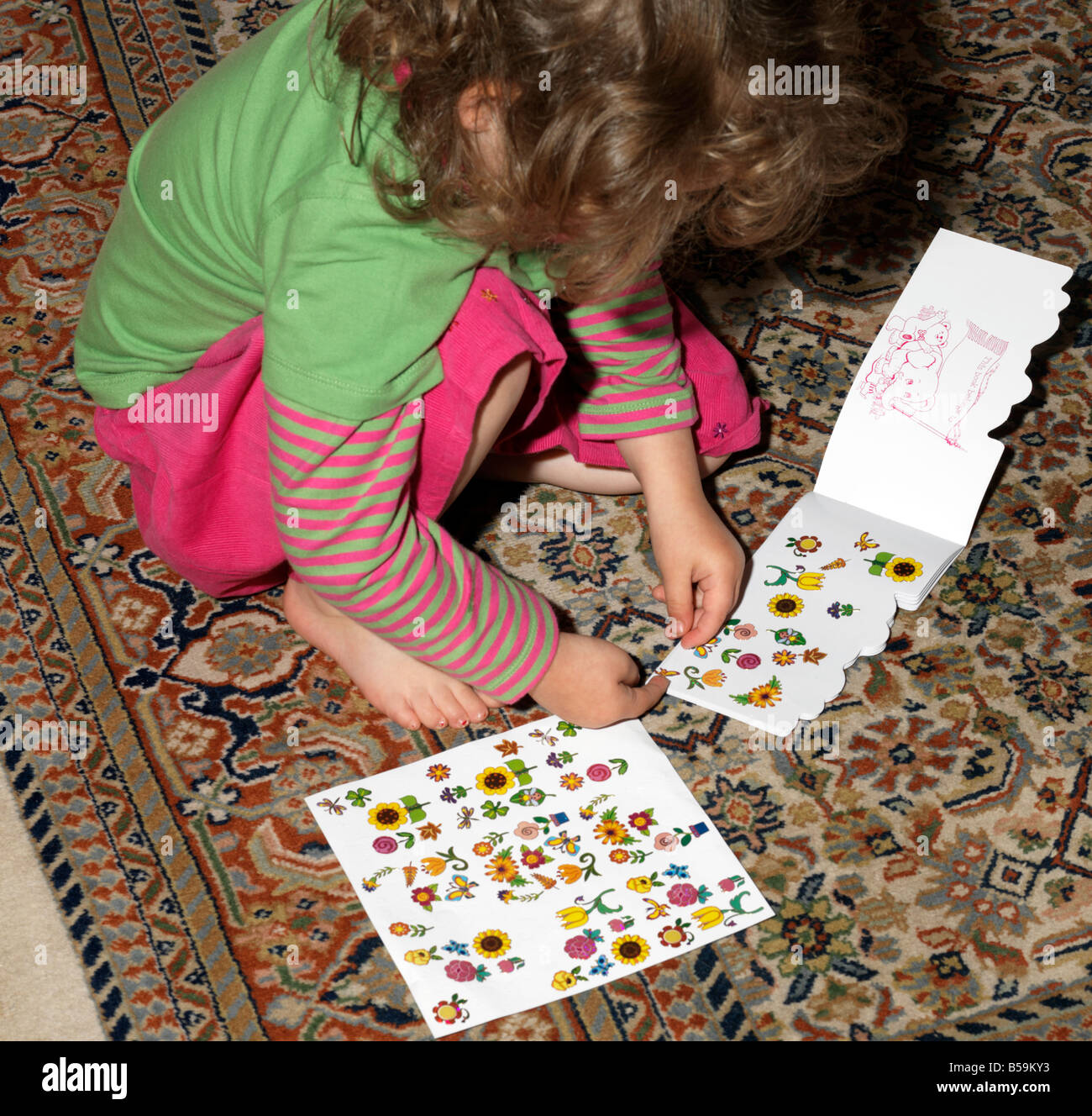 Child with Sticker Collectiion Stock Photo - Alamy