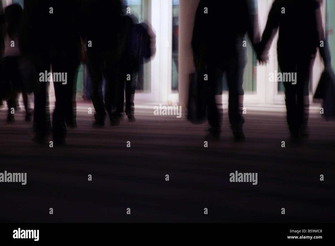 crowd of people walking in street at night Stock Photo - Alamy