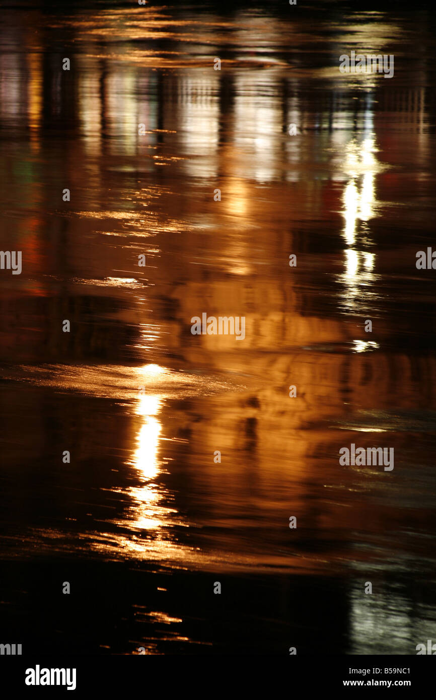 urban city town lights reflection in water night Stock Photo - Alamy