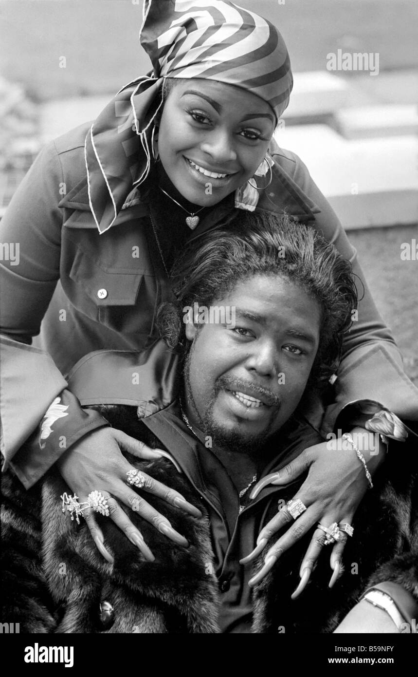 Pop star Barry White with his wife Goldean displaying her affections ...