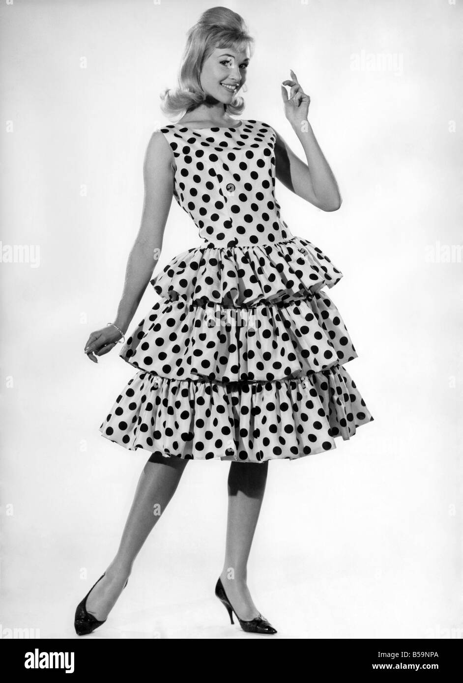 Polka dots dress Black and White Stock Photos & Images - Alamy
