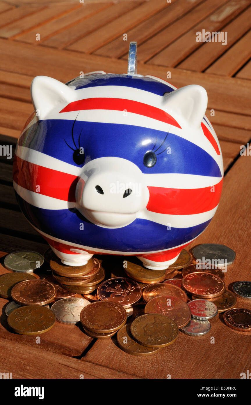 British Sterling piggy bank painted in the colours of the British red ...