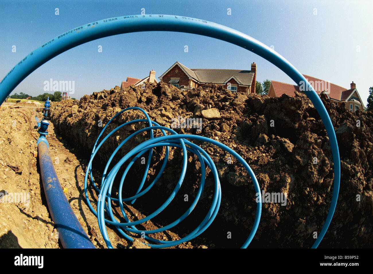 A series of pictures which show water from source in a reservior to tap ...