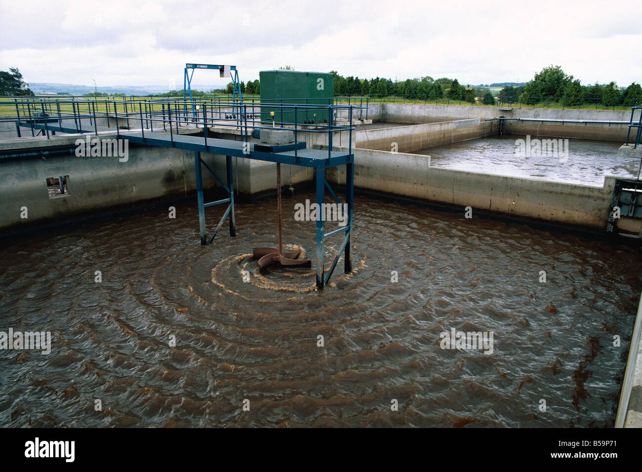 A series of pictures which show water from source in a reservior to tap ...