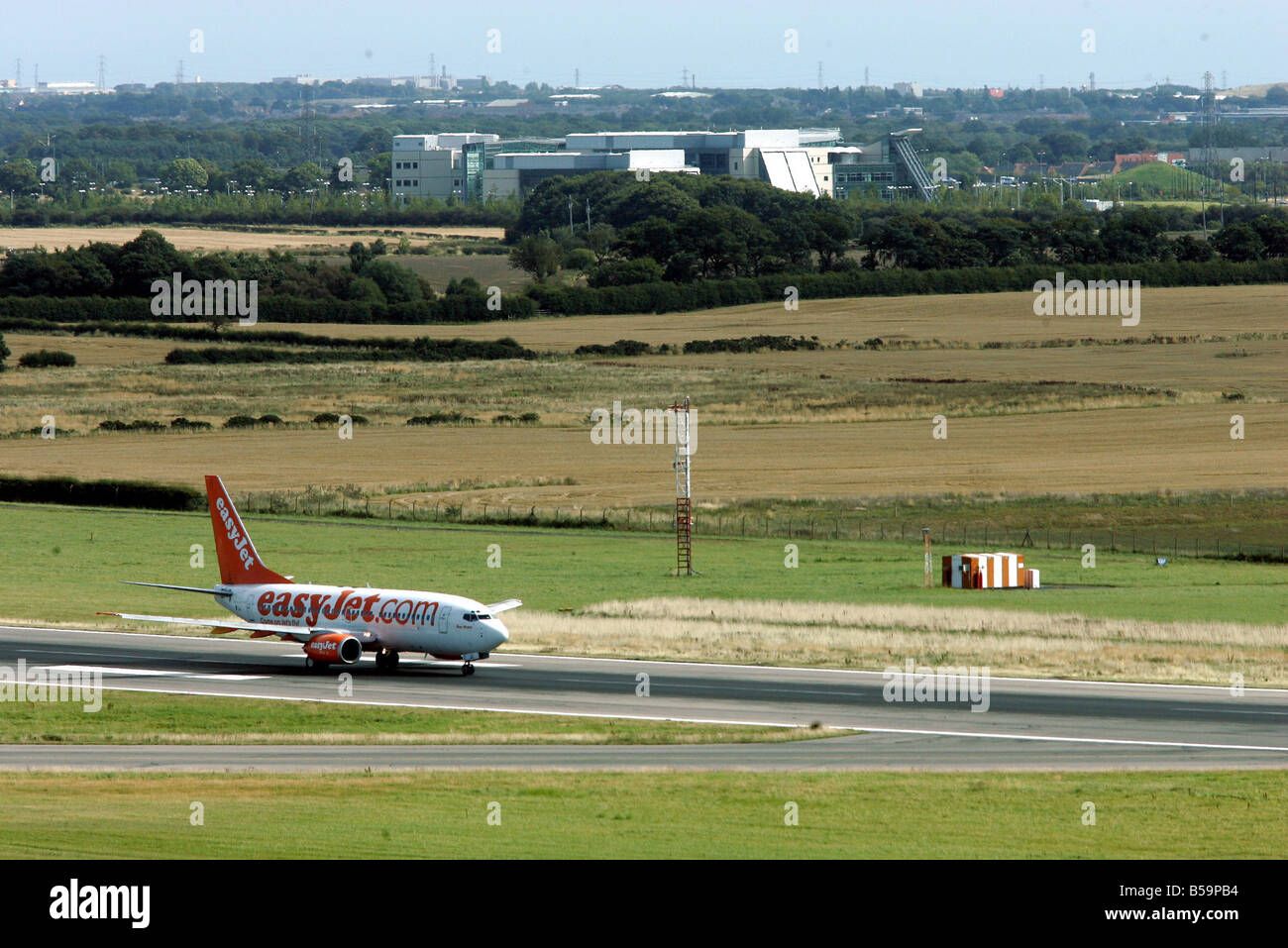 EasyJet plane taking off at Newcastle Airport Stock Photo - Alamy