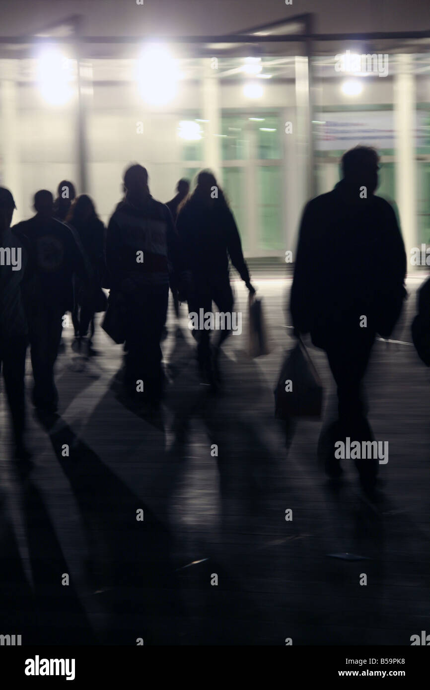 crowd of people walking in street at night Stock Photo - Alamy