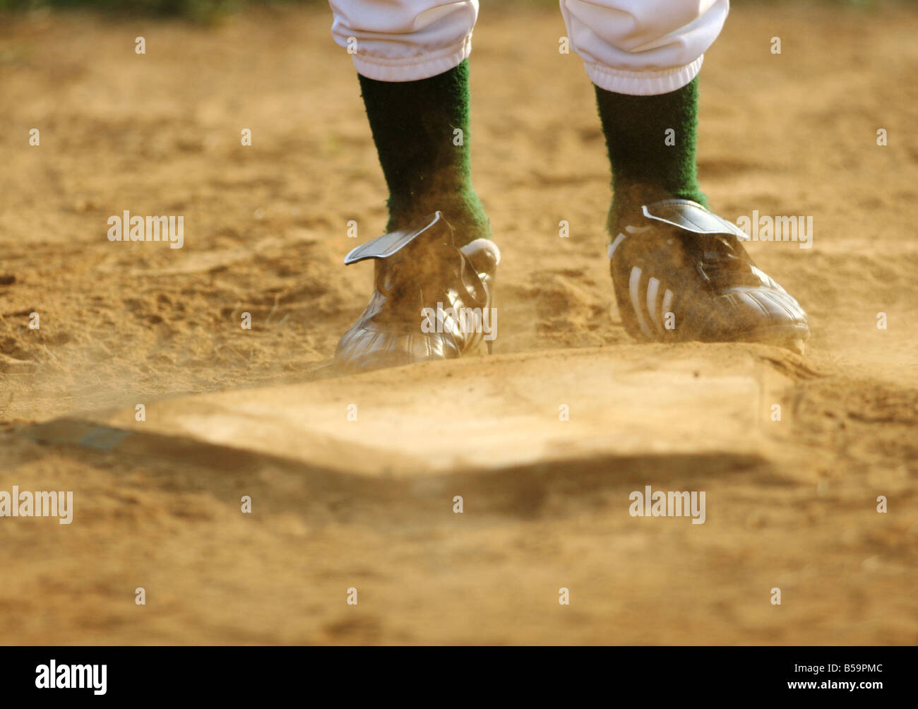 Standing at home plate Stock Photo - Alamy