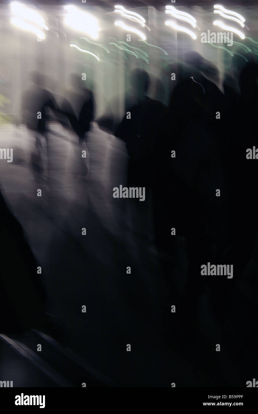 crowd of people walking in street at night Stock Photo - Alamy