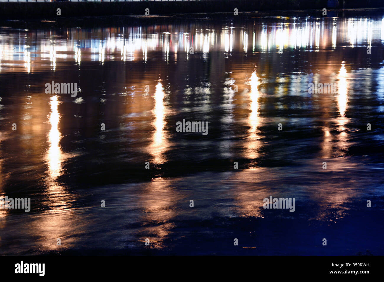 city town lights reflection in water night Stock Photo - Alamy