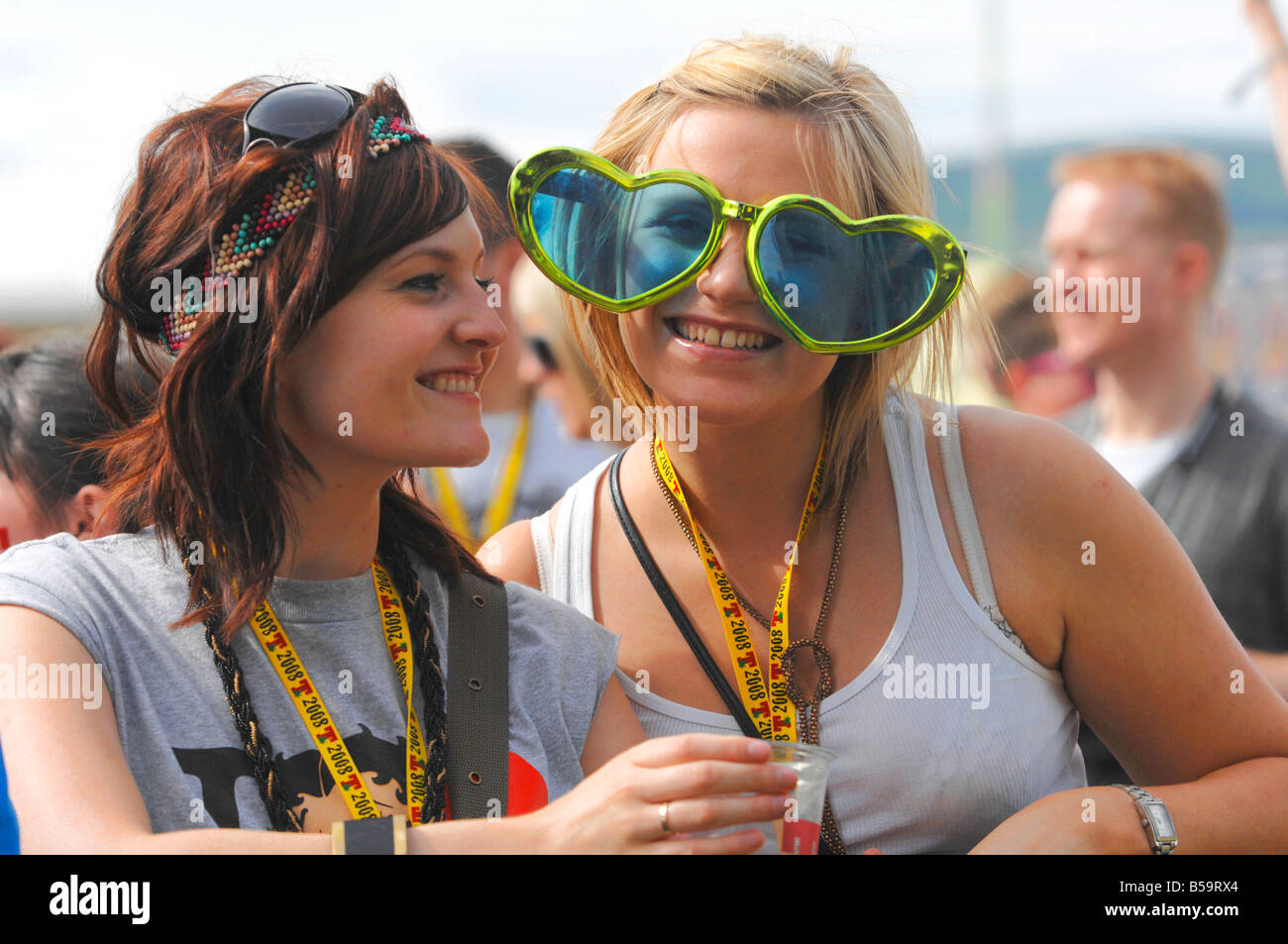 Teenage female fans watch live bands at the T in The Park Music ...
