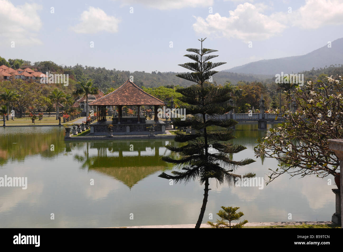Beautiful reflection of typical pavillion in the lake in Bali,Indonesia ...