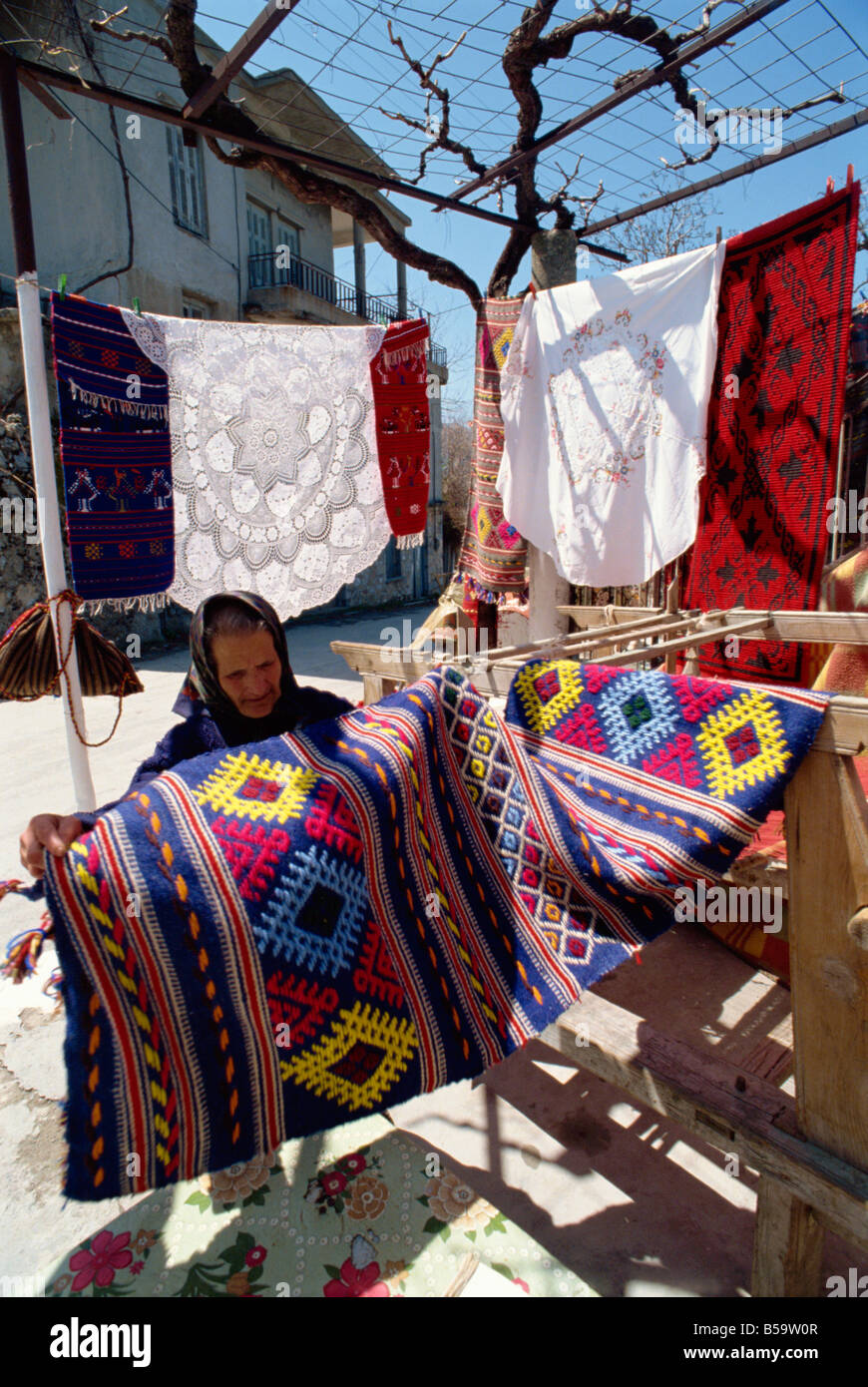 Woman weaver in village near Lasithi Plateau Crete Greek Islands Greece ...