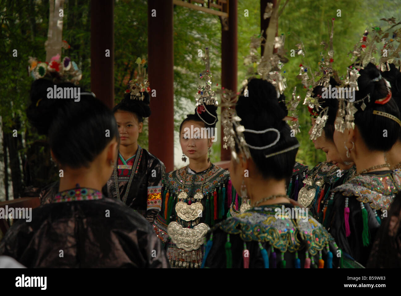 Women prepare to perform traditional music. They are members of the ...