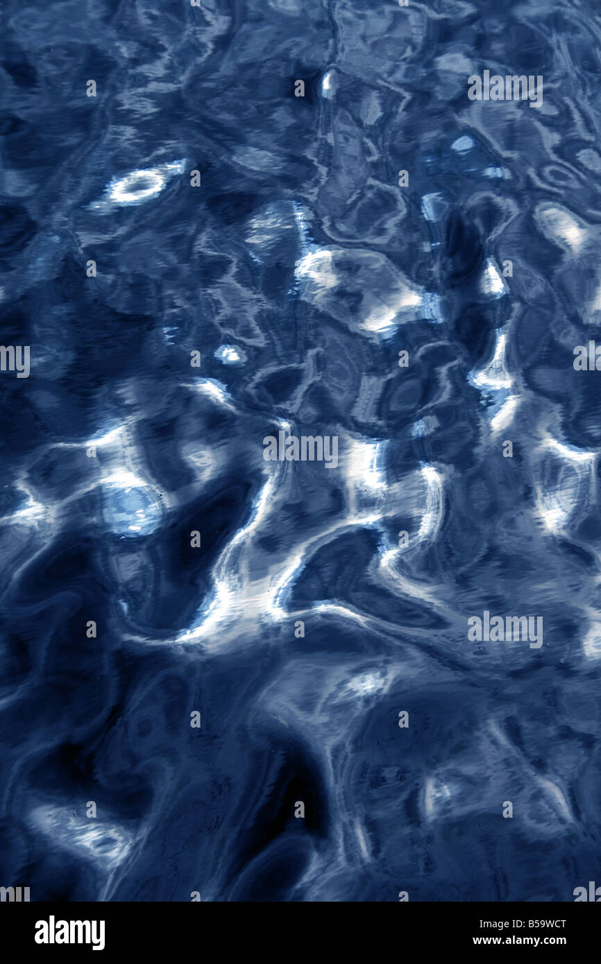 sun light reflection waves on lake water surface Stock Photo - Alamy
