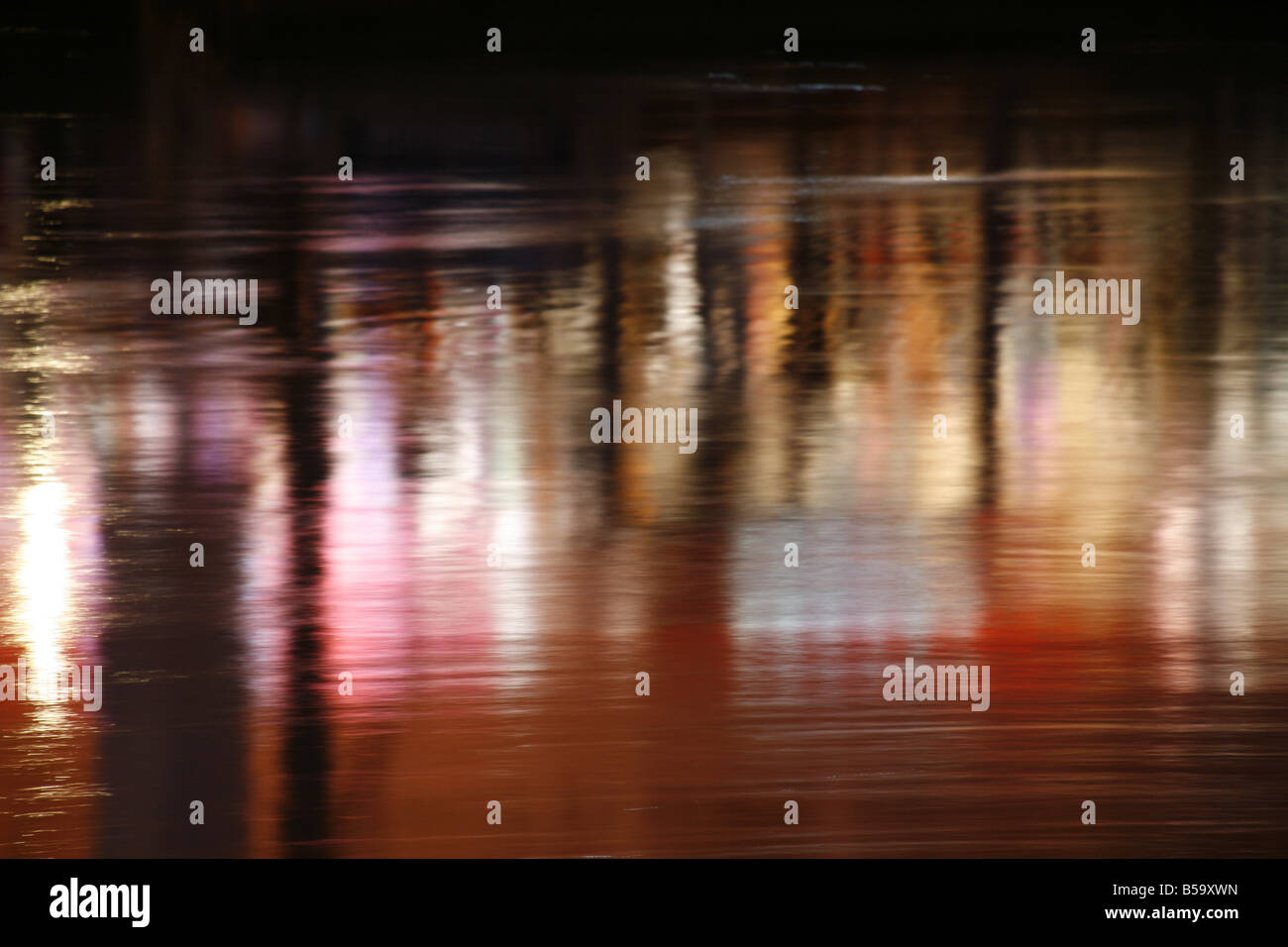 urban city town lights reflection in water night Stock Photo - Alamy