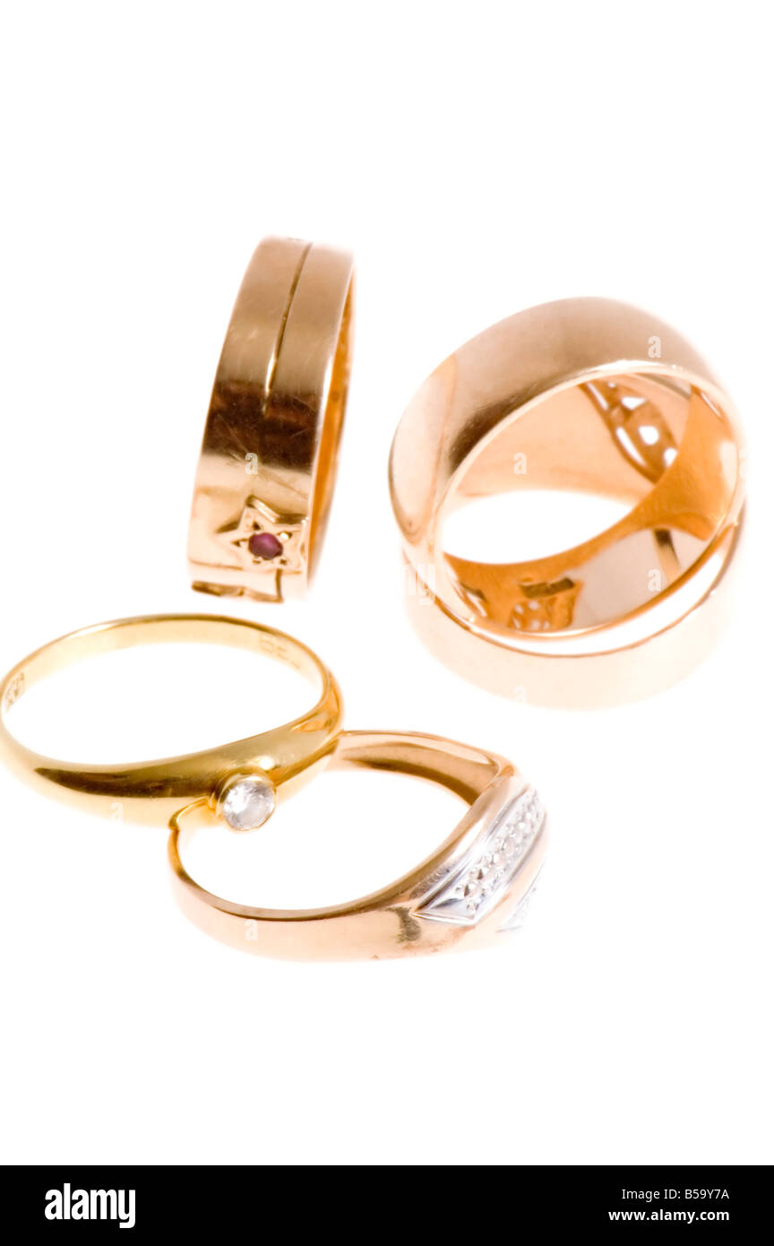 object on white Golden rings macro Stock Photo - Alamy