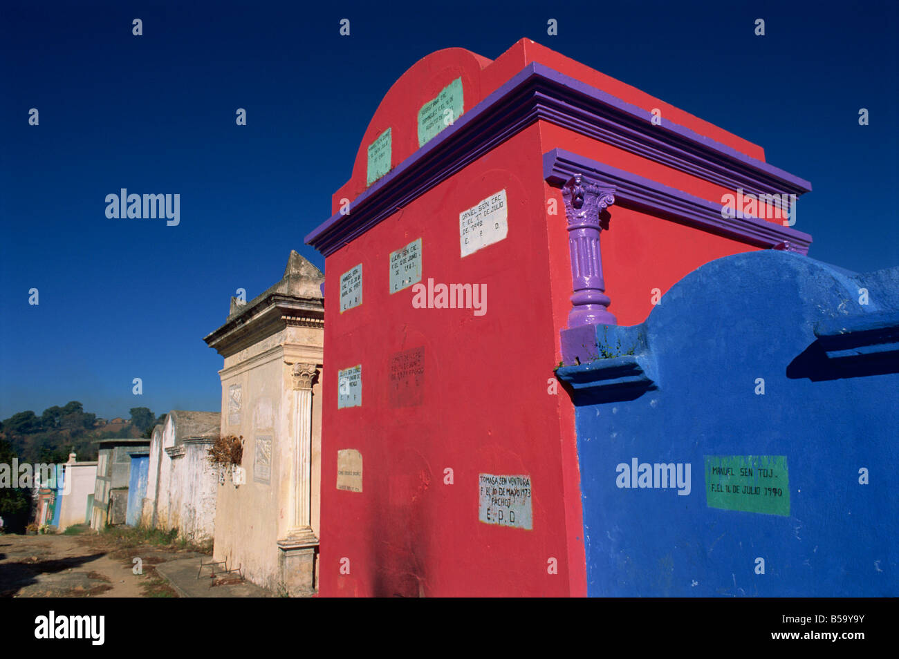 Brightly painted tombs in the technicolor cemetery at Chichicastenango ...
