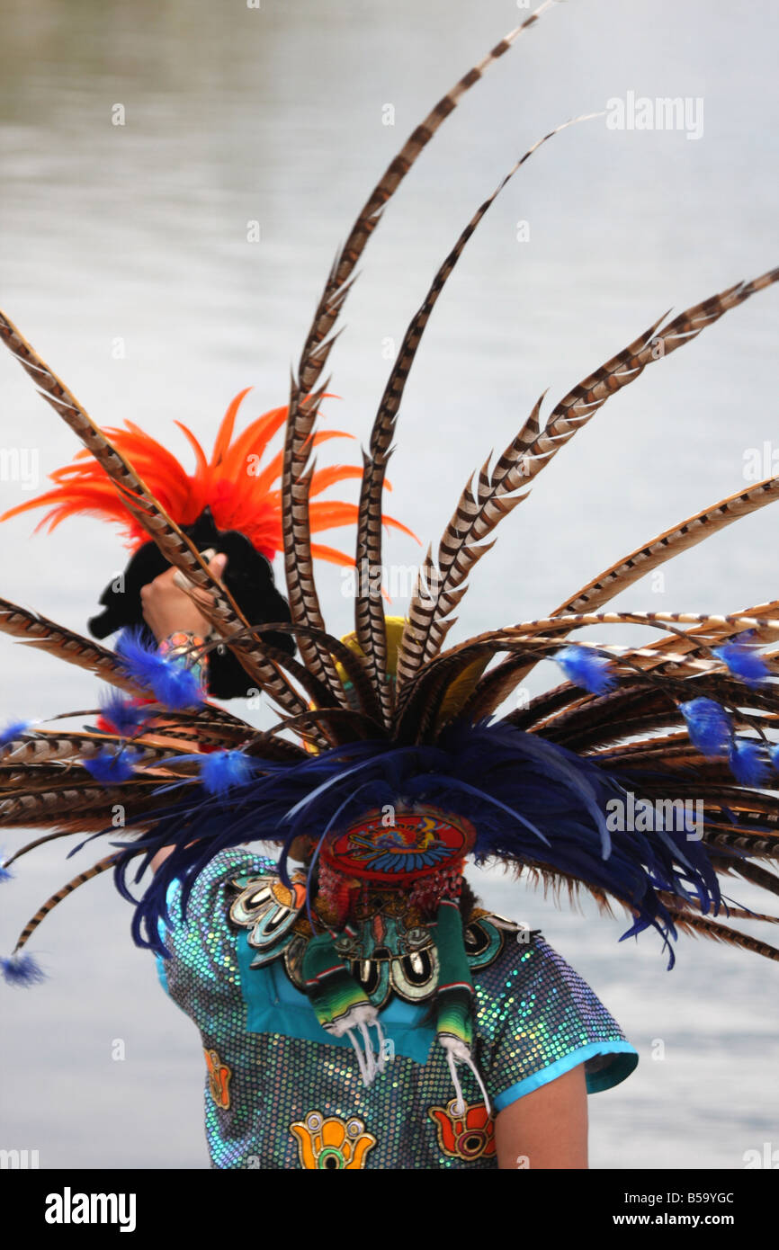 An Incan South American Indian in a fancy feather headdress at the ...