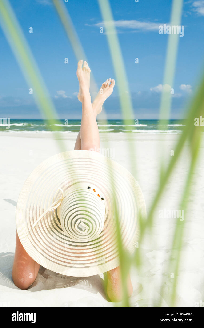young woman sunbathing Stock Photo - Alamy