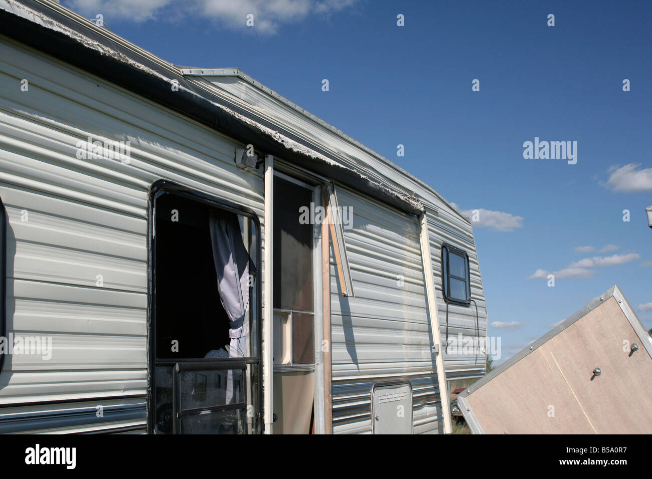 Caravan destroyed by a tornado Stock Photo - Alamy