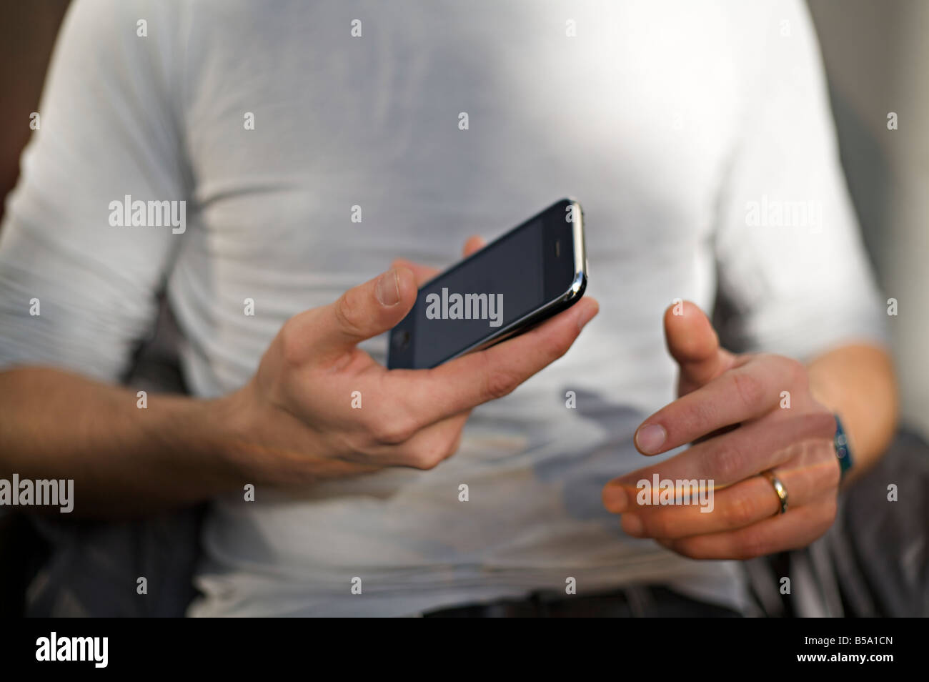 Man showing iPhone screen Stock Photo - Alamy