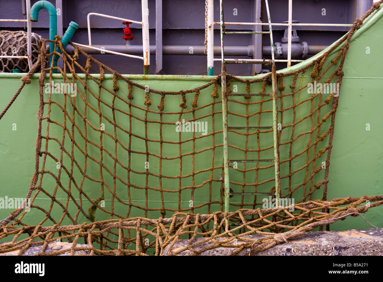 Rope netting on the side of a ship, Kaohsiung Harbor, Kaohsiung, Taiwan ...