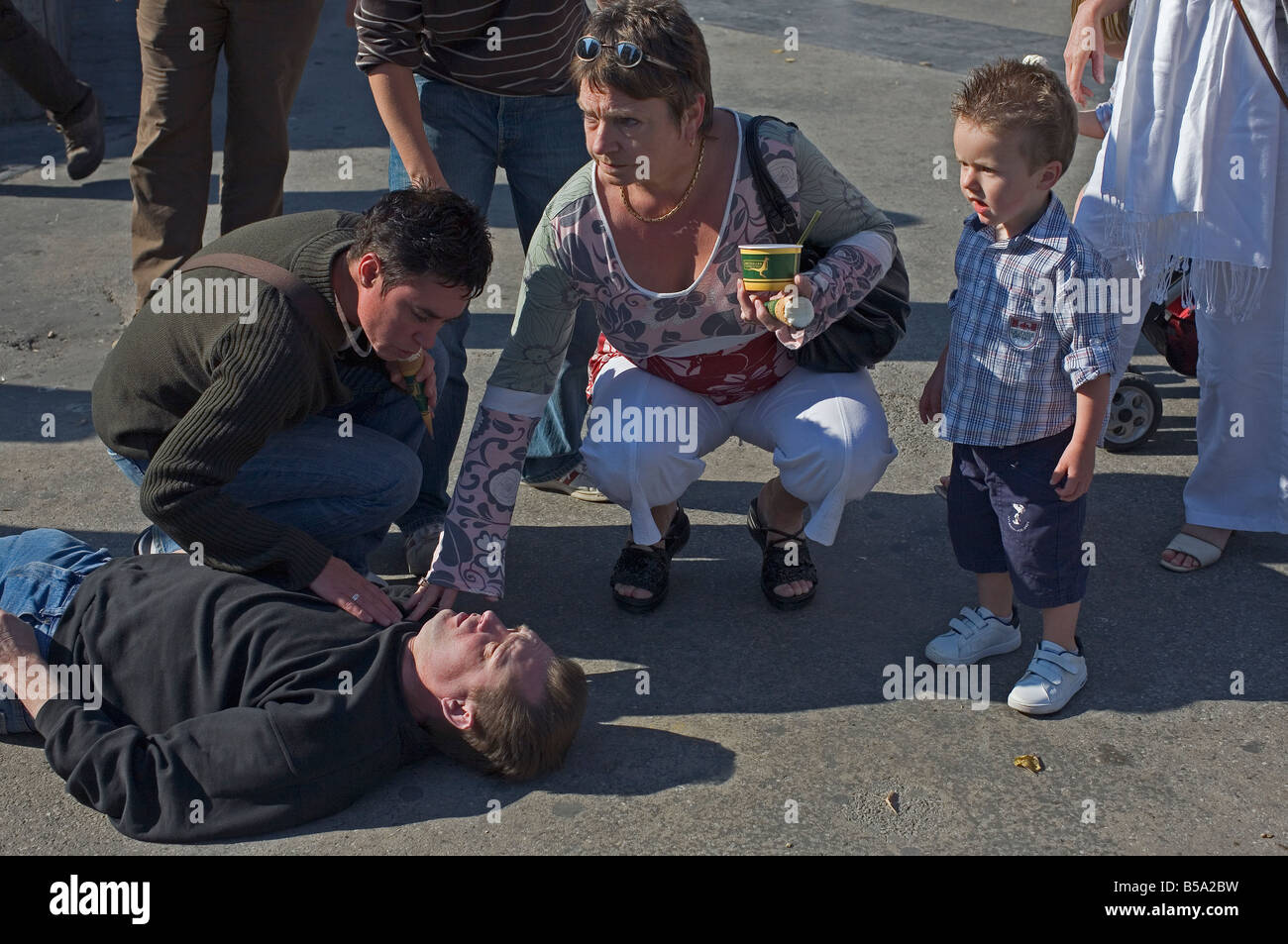 Young Man badly beaten up by Opponent,bystanders are giving first aid ...