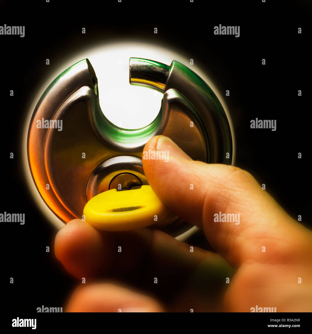 Hand lock key hi-res stock photography and images - Alamy