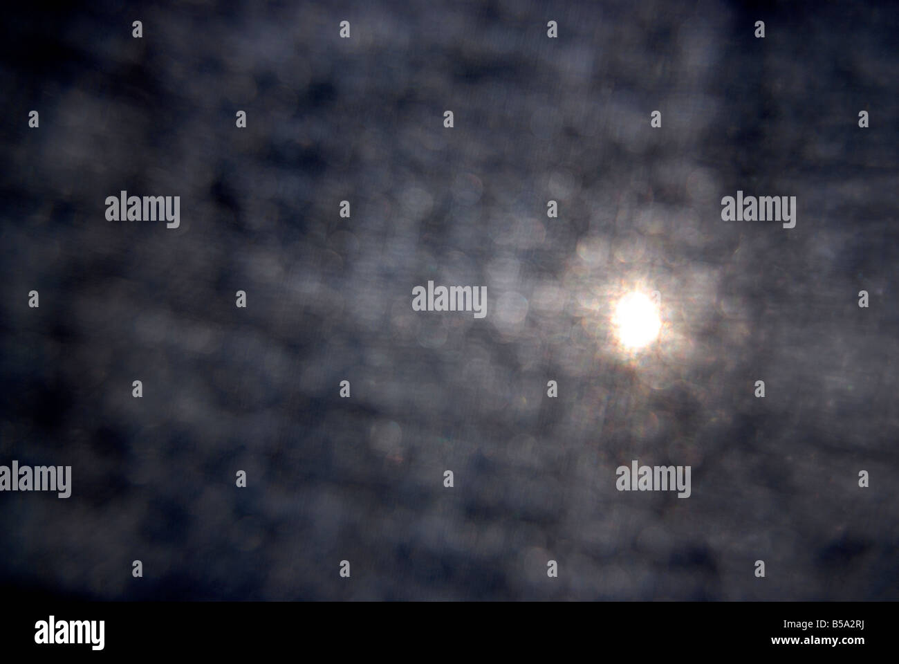 SUN BEHIND CURTAIN Stock Photo - Alamy