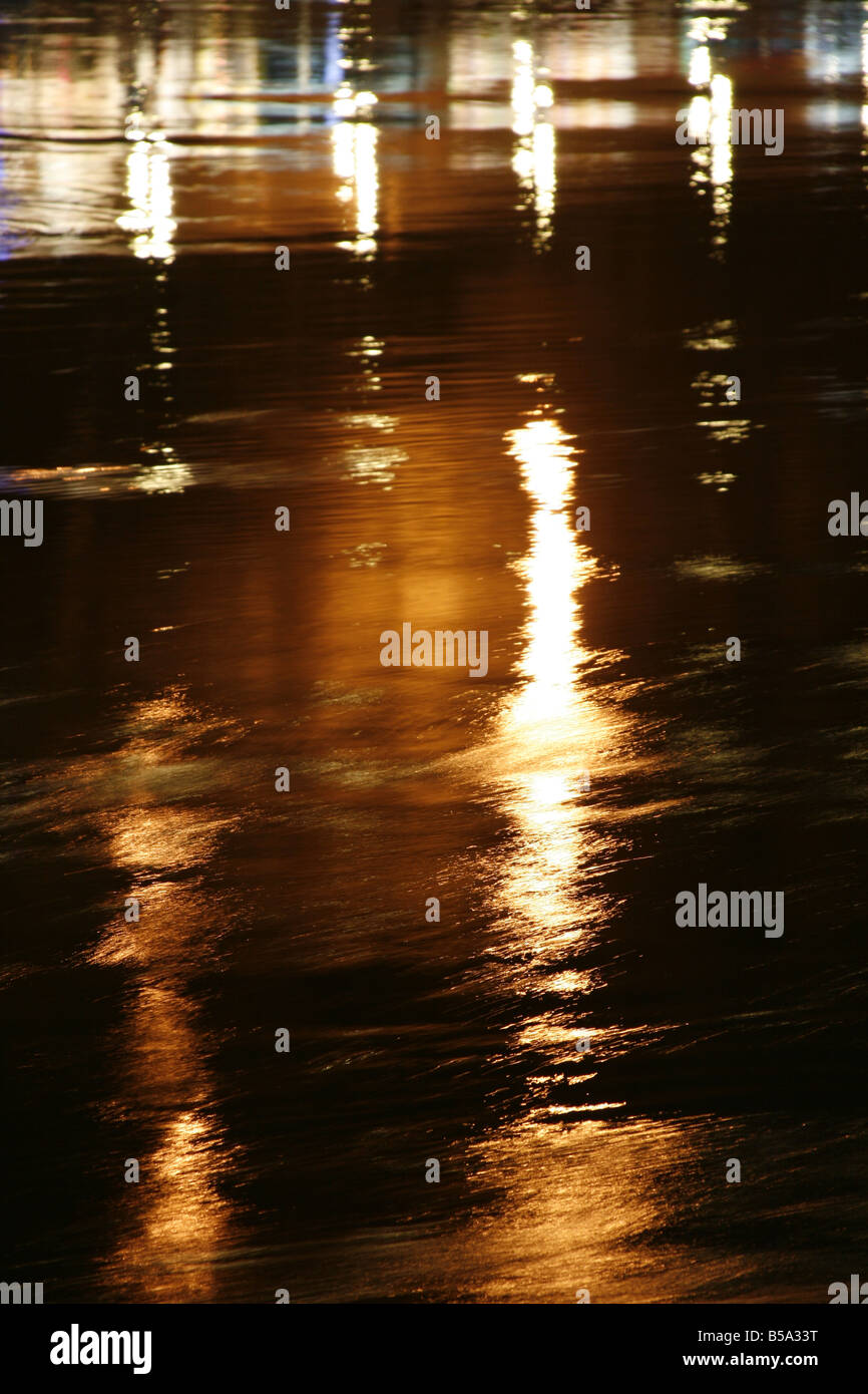 city town lights reflection in water night Stock Photo - Alamy
