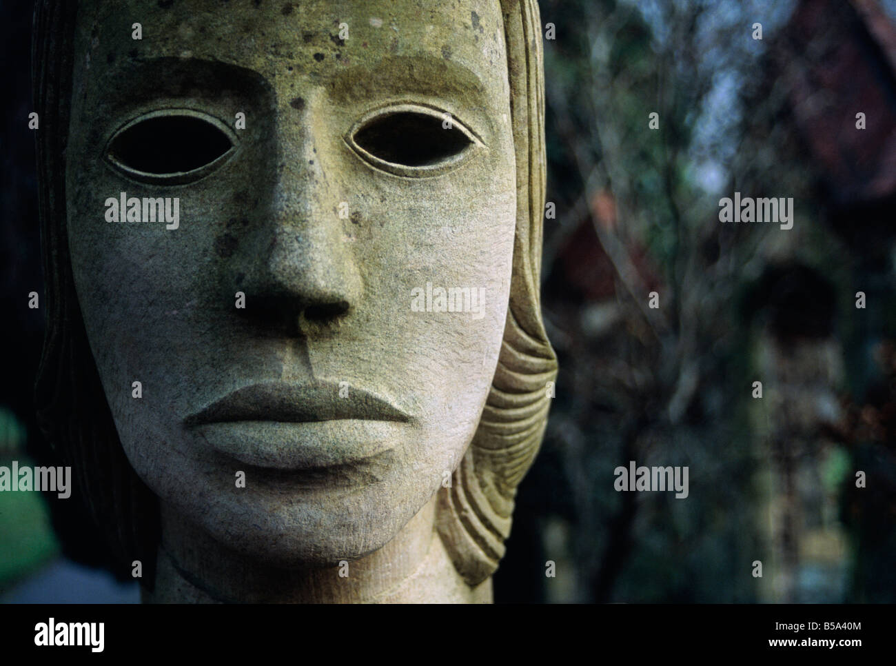 Southover Grange gardens Sculpture Figure of person Face LEWES SUSSEX ...