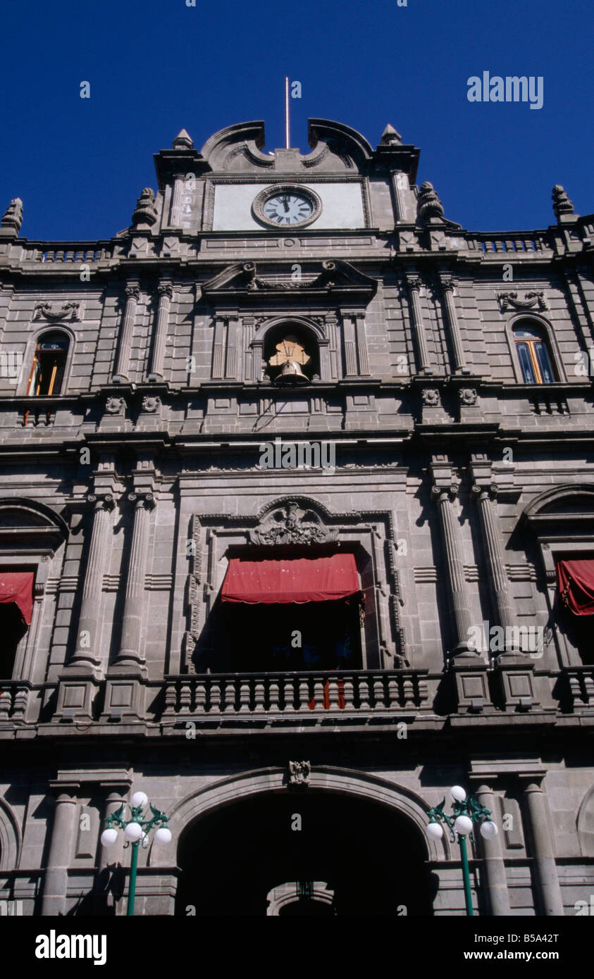 City Facade of buildings Traditional Hispanic style Clock Low angle ...