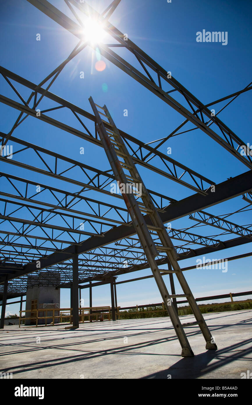 Low angle view of ladder and building framing Stock Photo - Alamy