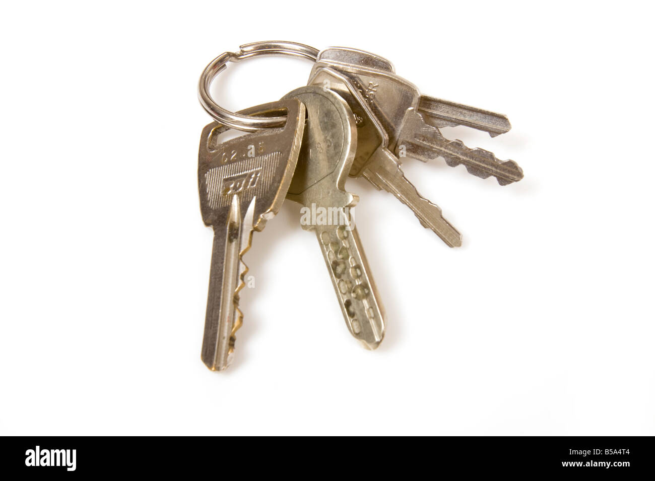 Bunch of house keys isolated on a white studio background Stock Photo ...