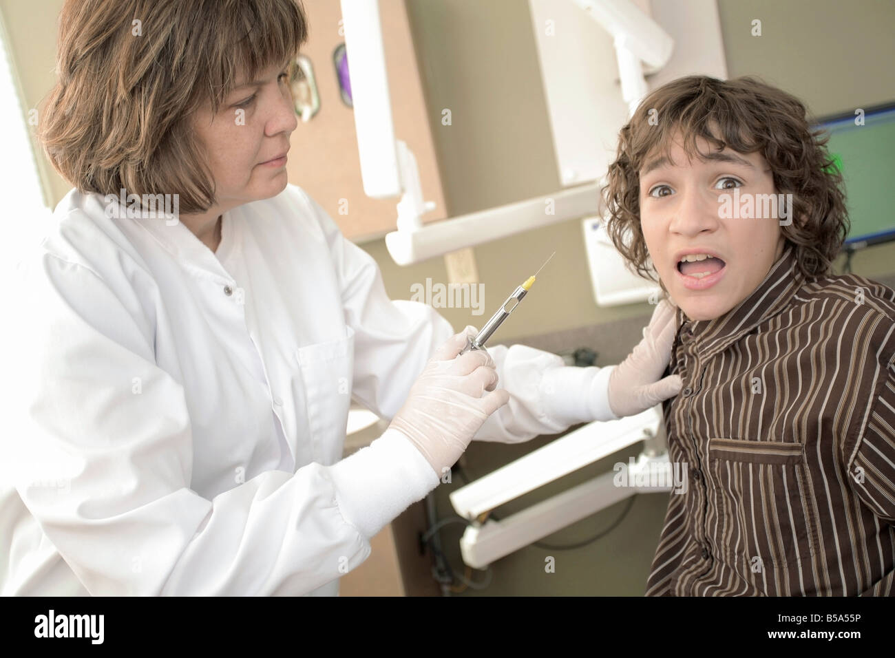 Boy about to get needle Stock Photo - Alamy