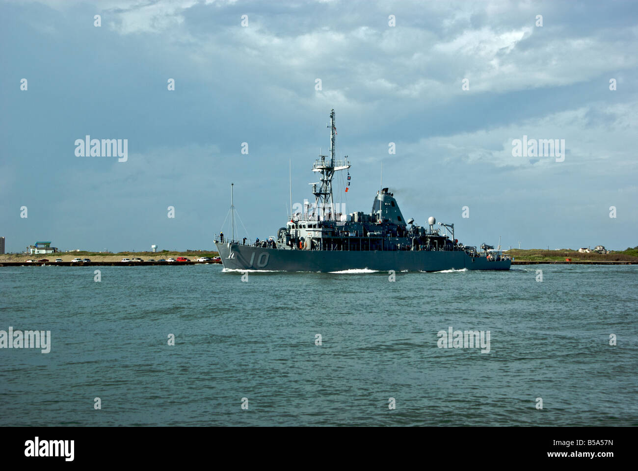 U S Navy naval war ship sailing into Gulf of Mexico from Port Aransas ...