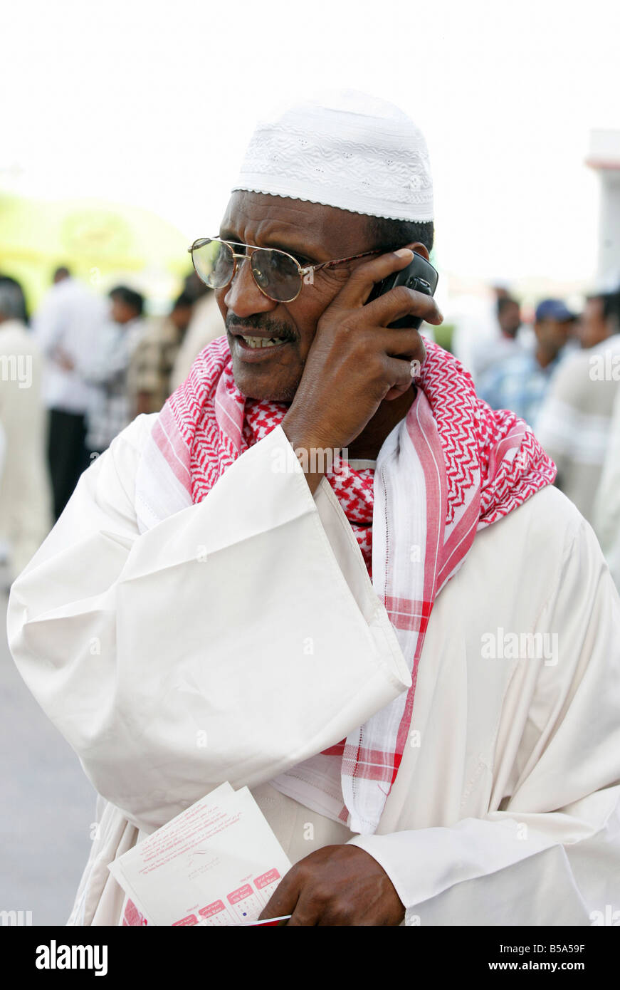 Arab man with a mobile phone Stock Photo - Alamy