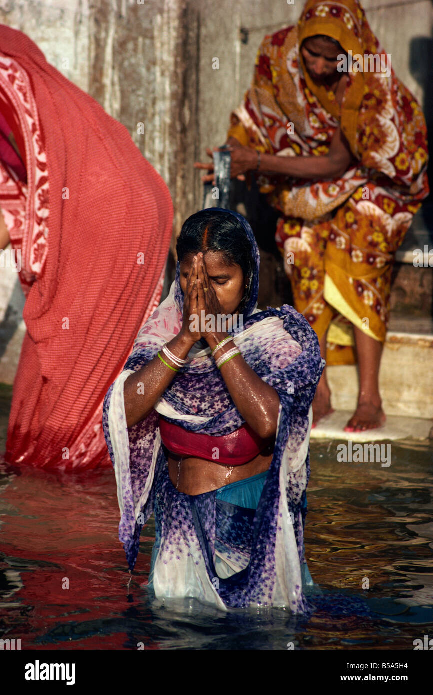 Woman praying, India Stock Photo - Alamy