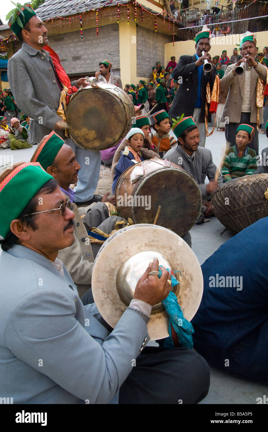 Group of musicians and women dancing during Ataro religious festival in ...