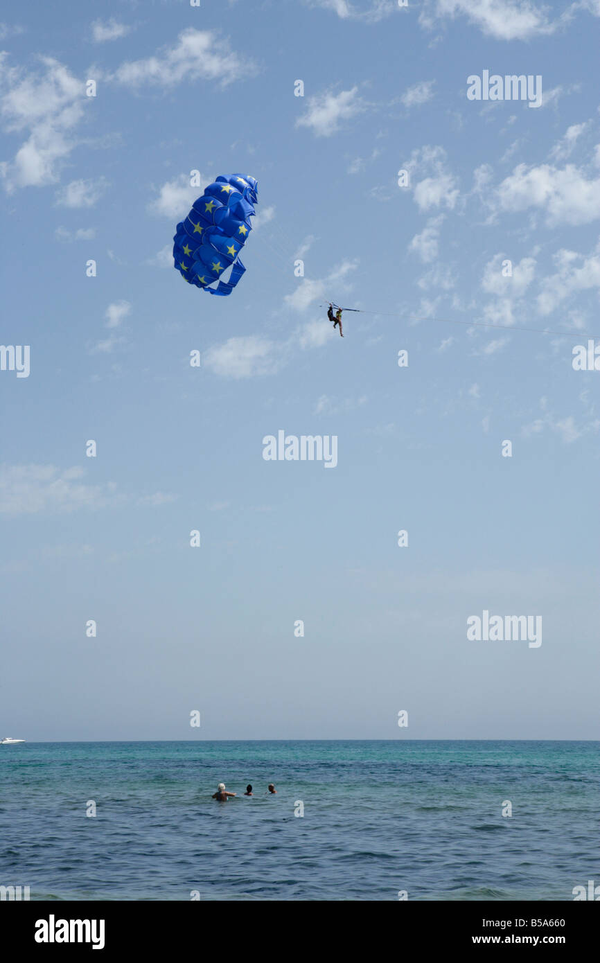 Parachute, parachouting, paratrooper, sea, sky, clouds Stock Photo - Alamy
