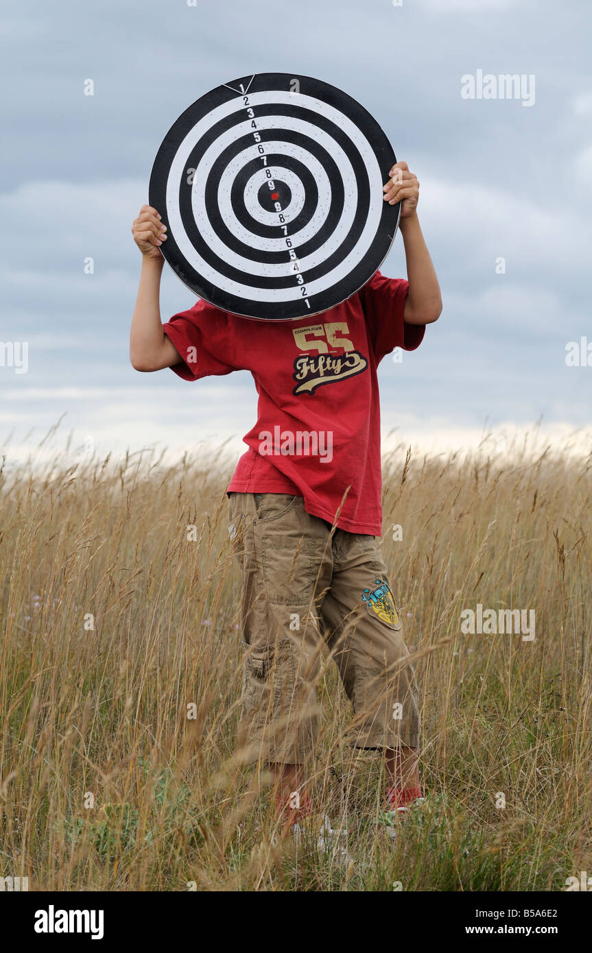 child holding a target Stock Photo - Alamy