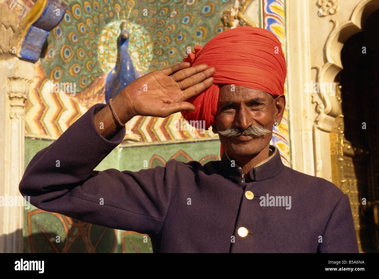 Guard in turban saluting at City Palace Jaipur Rajasthan state India ...