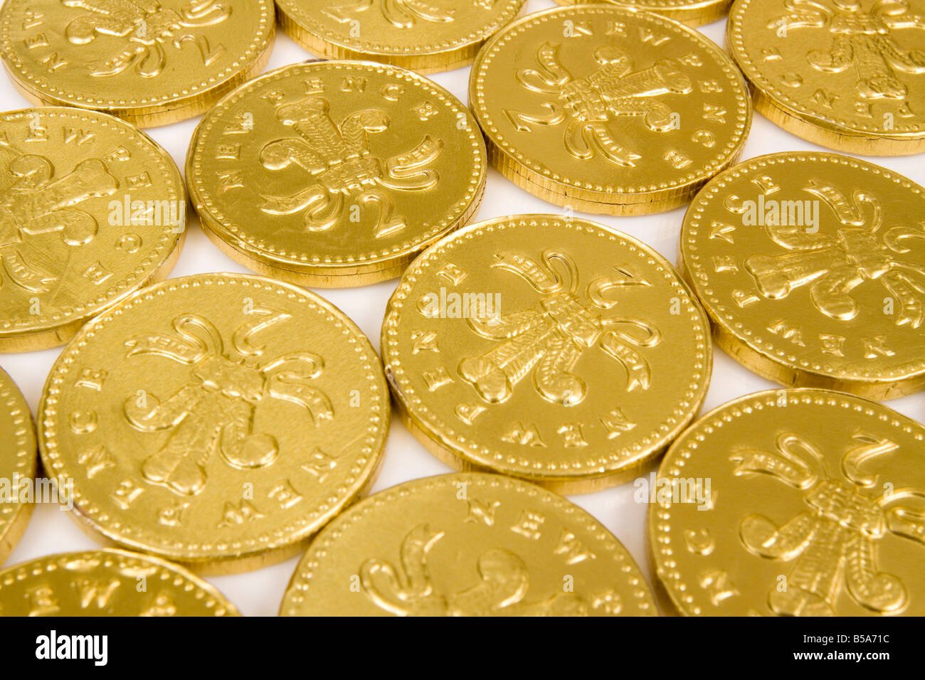 Chocolate money isolated on white studio background Stock Photo - Alamy