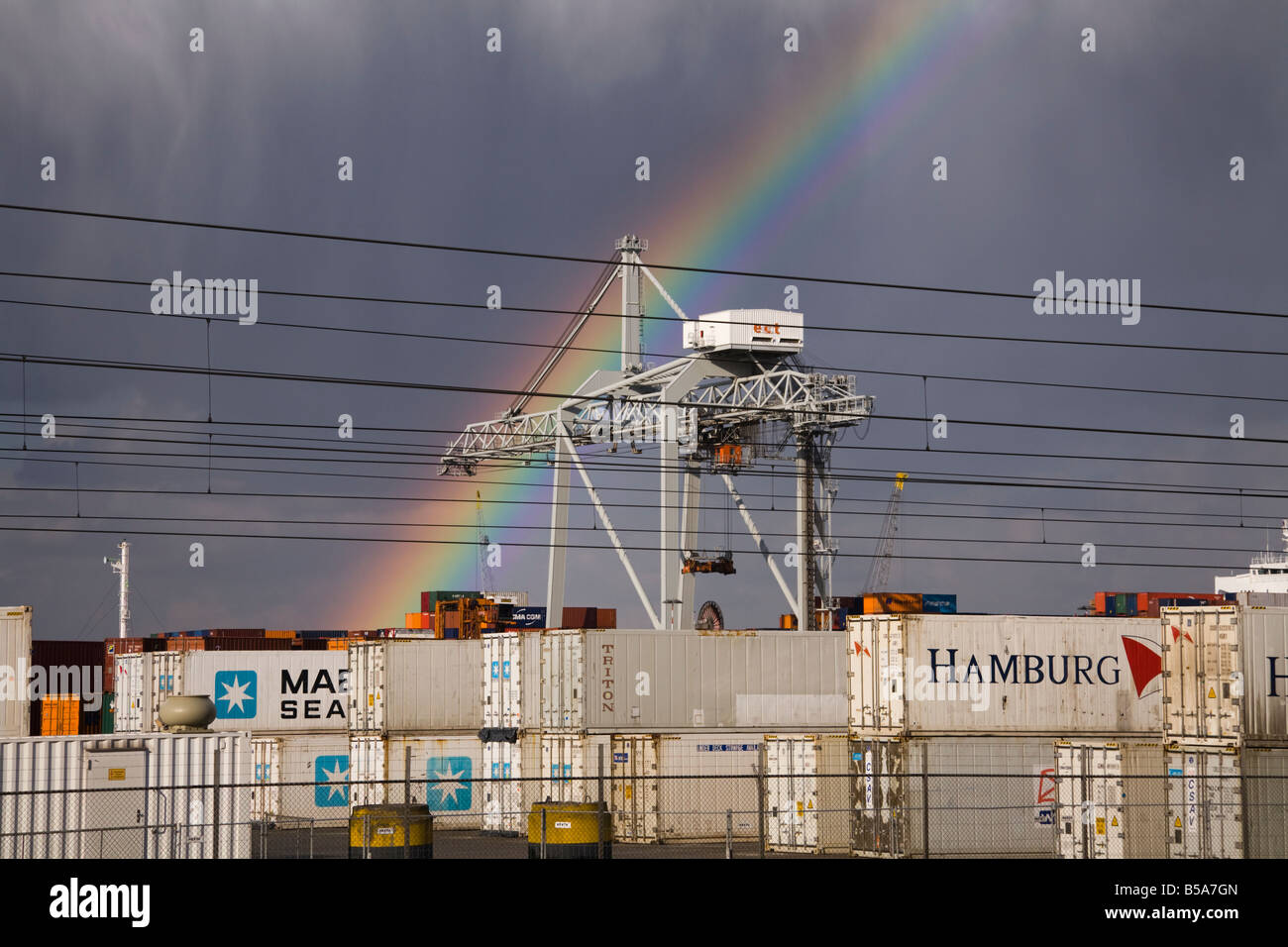 Containers and rainbow at the Pernis cargo terminal near Rotterdam ...