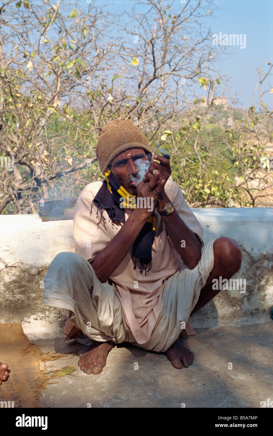 Man smoking drugs near Deogarh Rajasthan state India Asia Stock Photo ...