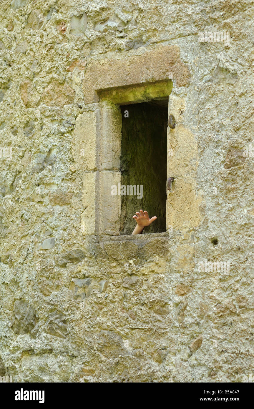 a hand waving by the window Stock Photo - Alamy
