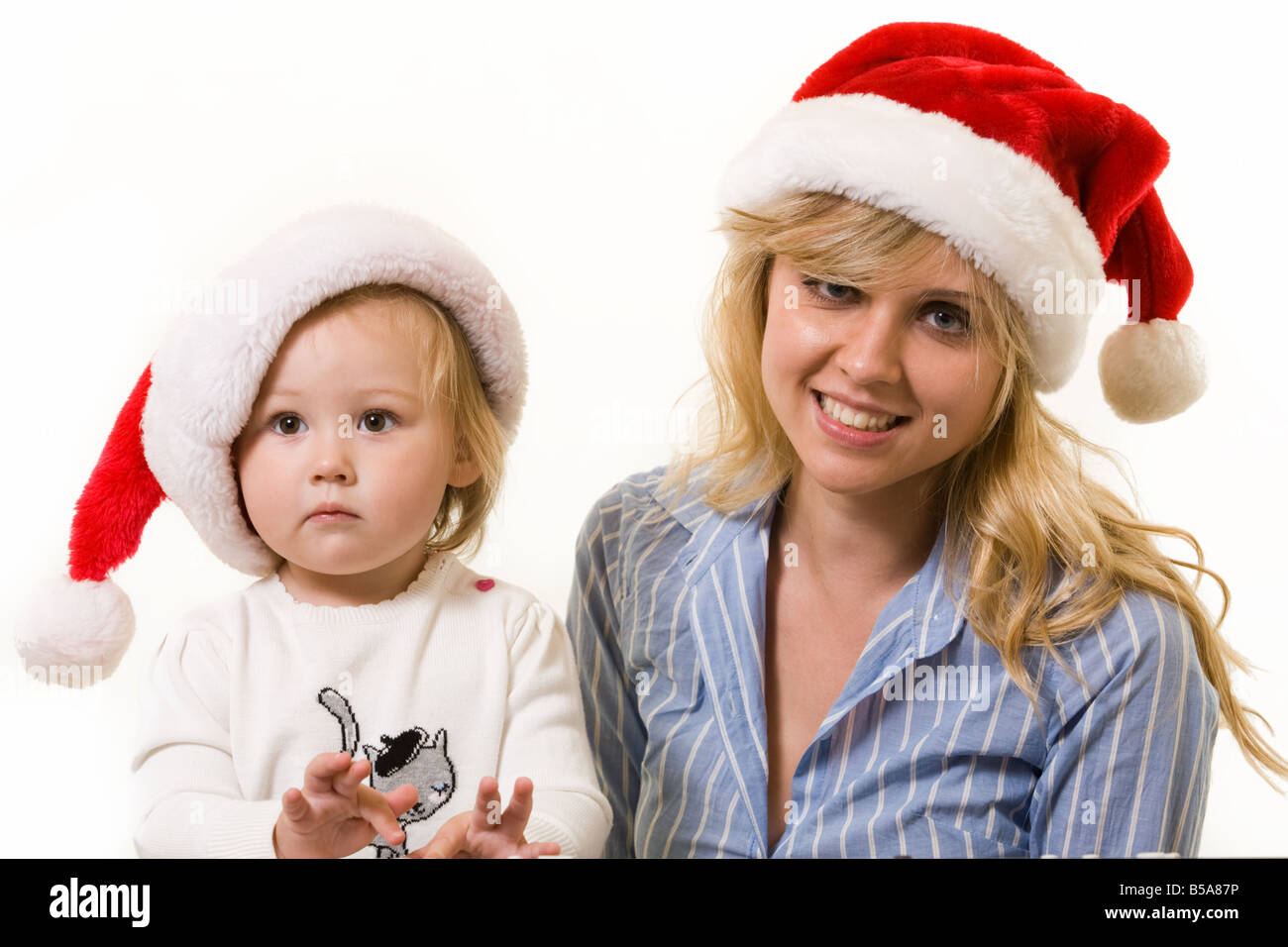 Mom and child Santa Stock Photo - Alamy