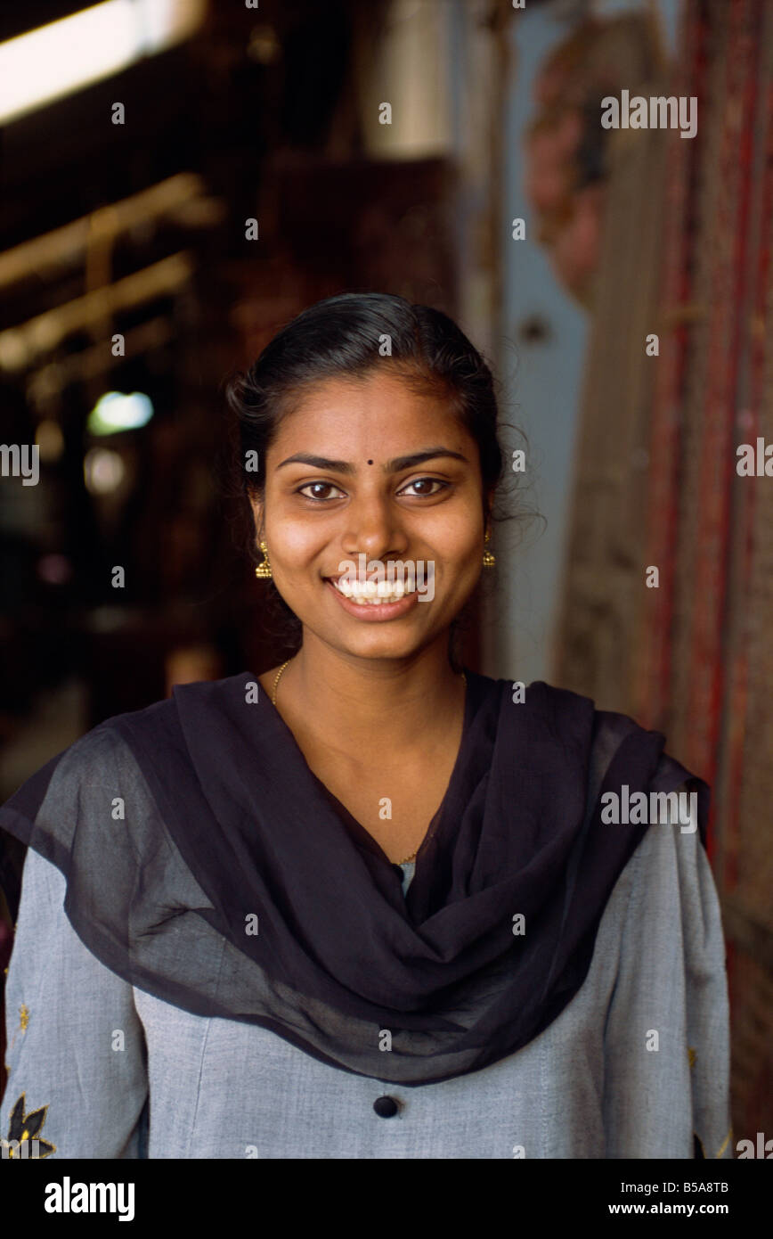 Portrait of a shop assistant inantique area of Jewtown, Fort Cochin ...