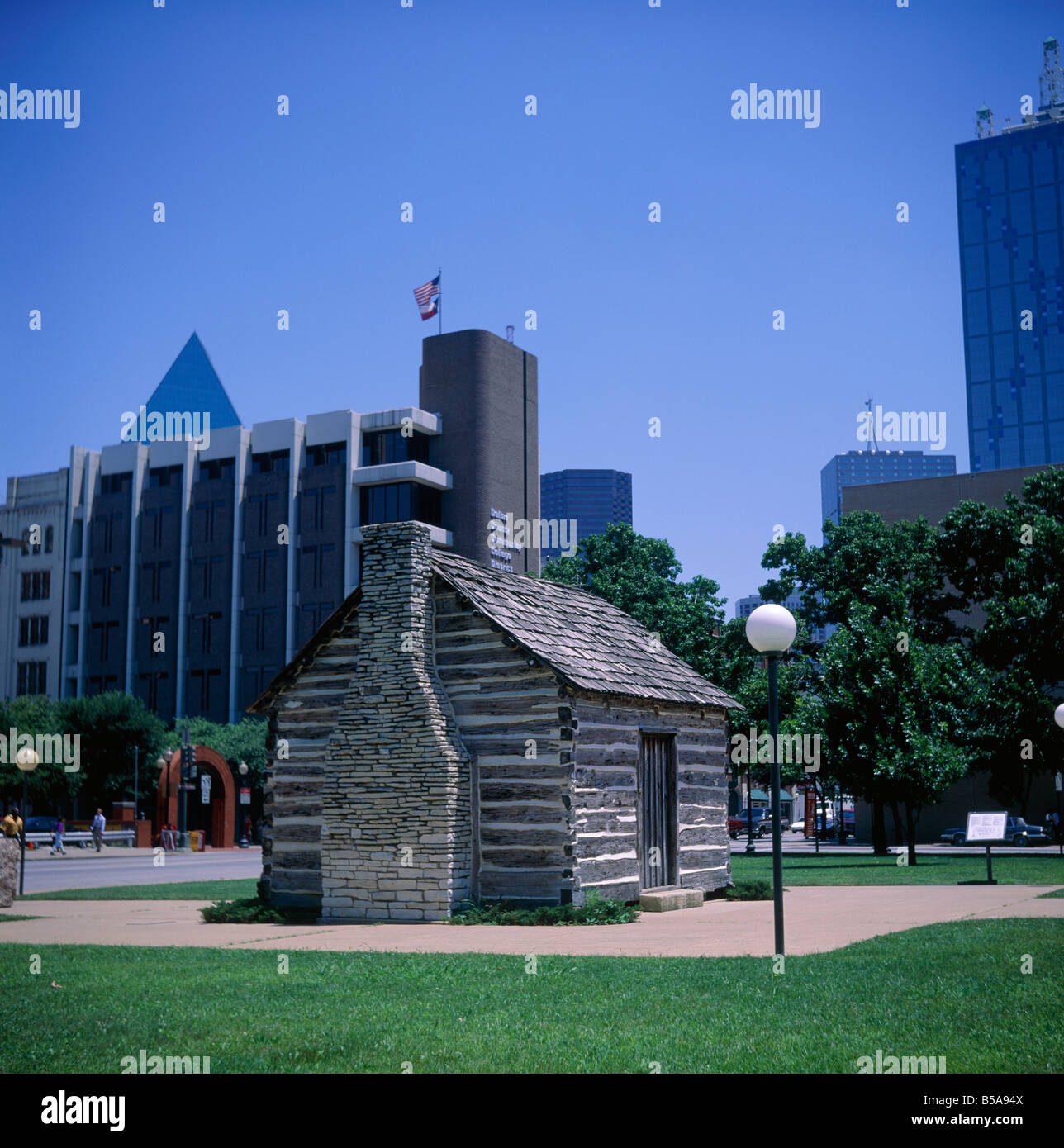 John Neeley Brian founderÕs cabin Modern buildings behind Lamps Trees ...