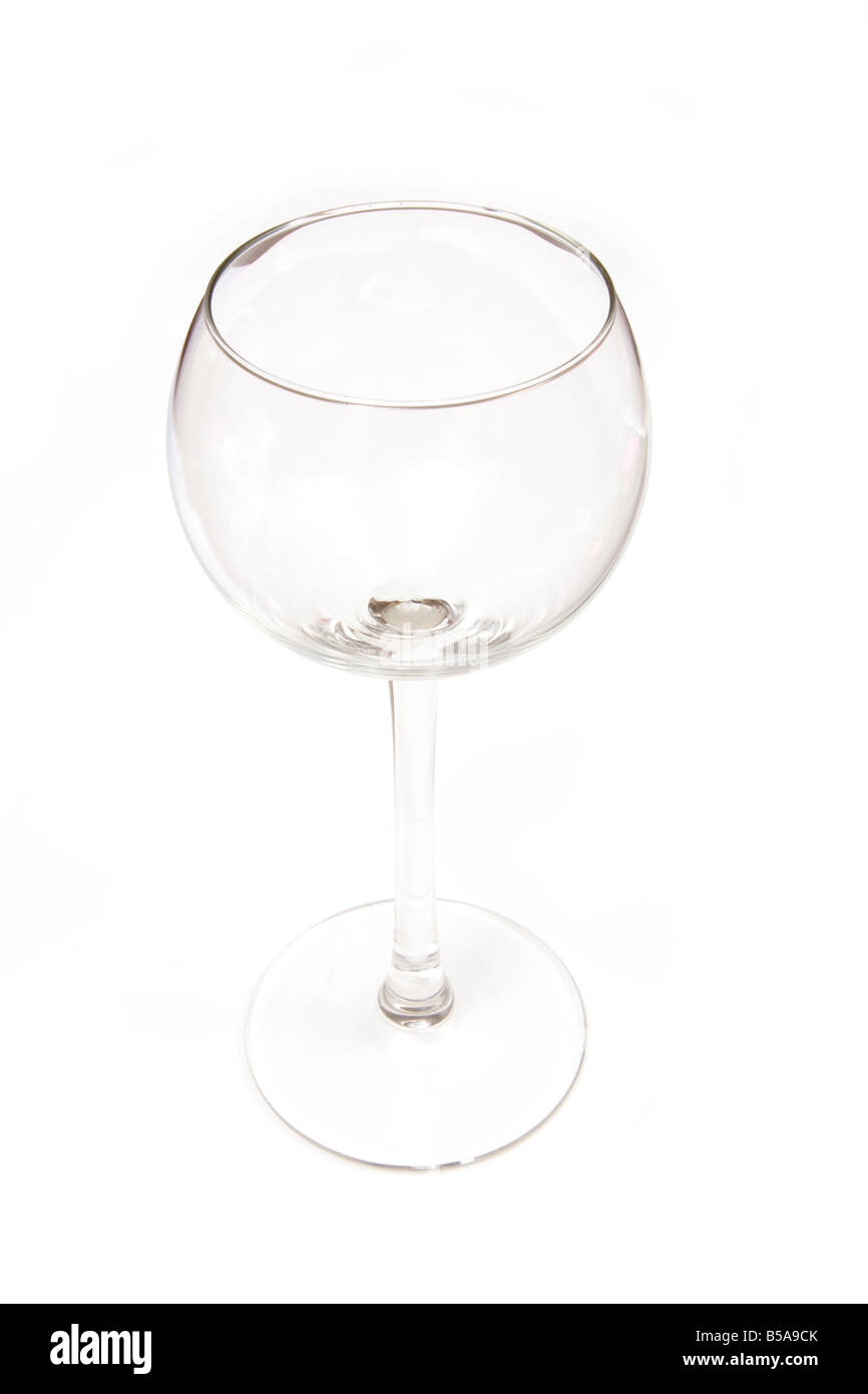 Empty spirits glass isolated on a white studio background Stock Photo ...